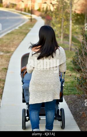 Woman, pushing Stroller Stock Photo - Alamy
