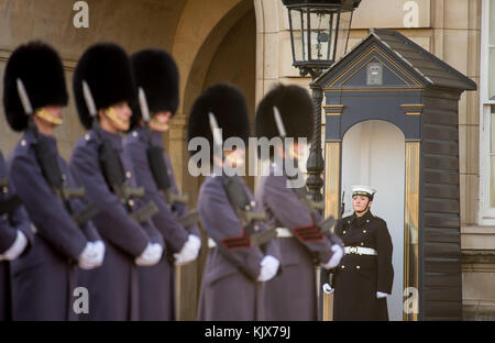 Able seaman Laura Suttle takes her position in a sentry box, as sailors ...