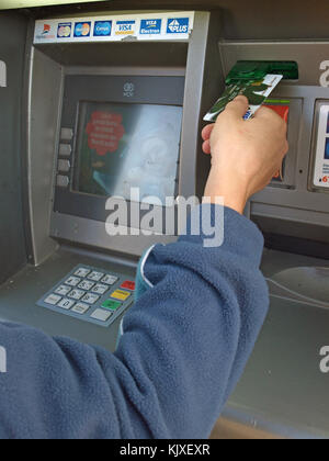 Close-up view of cash machine and woman's hand with credit card Stock ...
