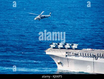 MH-60S Sea Hawk from Helicopter Sea Combat Squadron (HSC) 26 is secured ...