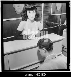 A portrait of Vivien Garry and Teddy Kaye taken at Dixon's, New York, in May 1947, capturing a ...