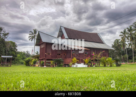 Typical Malay wooden Kampung house on stilts, Malaysia Stock Photo - Alamy
