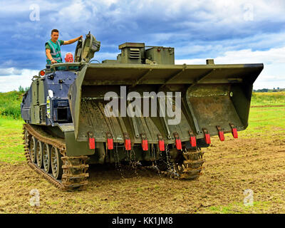 A Royal engineers Combat Engineer Tractor, on its road transporter, at ...