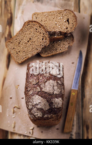 Bakery. Fresh fragrant baked bread. Homemade bread on wooden background ...