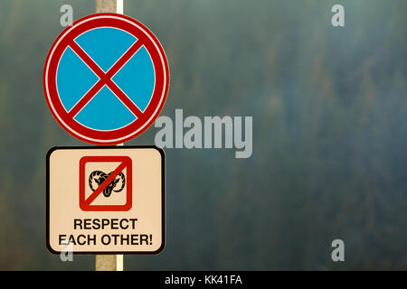 Do not park road sign with words respect each other Stock Photo - Alamy