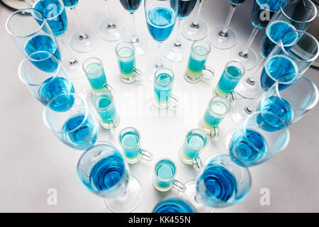 blue champagne in glasses, unusual welcome-drink Stock Photo - Alamy