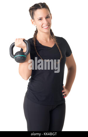 Female Personal Trainer, holding a kettlebell, in a gym Stock Photo - Alamy