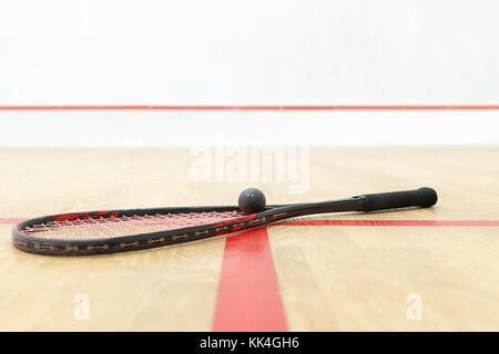 racquetball equipment and wall with red lines Stock Photo - Alamy