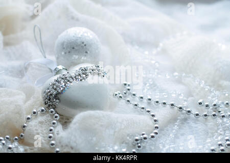 Christmas toys and balls to knit the scarf. Decorations on holid Stock ...