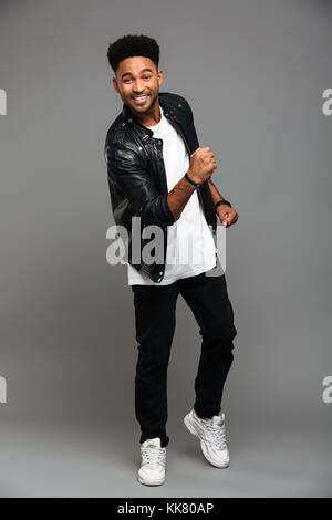 Hes a yes man. A handsome young businessman holding a placard with yes ...