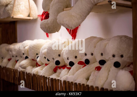 On The Shelf: Collection of teddy bears arranged on wall shelf, front ...