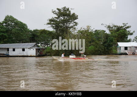 Traditional Amazon rainforest housing, floating house, Amazon river ...