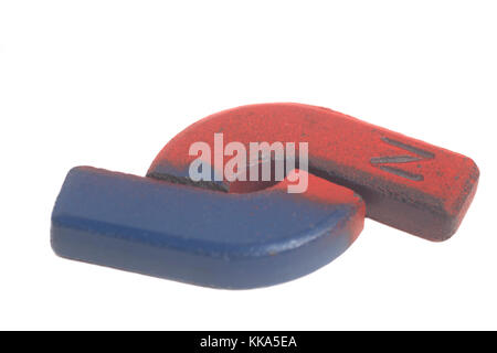 Broken magnet isolated on white Stock Photo - Alamy