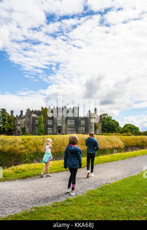 Children walking around the moat at Birr Castle, Ireland Stock Photo ...