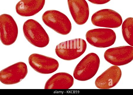 Closeup of red hard candies arranged aesthetically on one side Stock ...