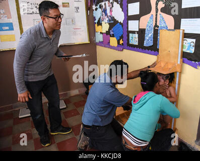 Army Lt. Col. (Dr.) Steven Hudak (center), BAMC urology surgeon ...