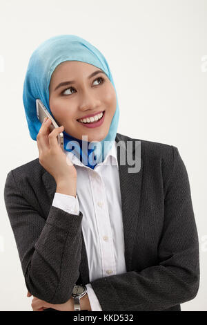 malay business woman talking using mobile phone Stock Photo - Alamy