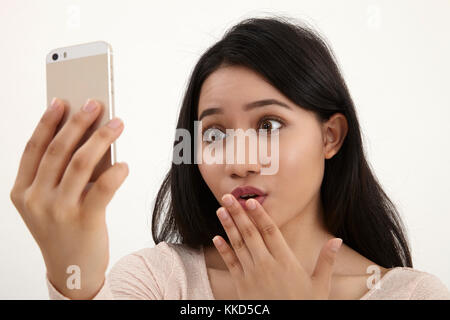 malay woman making a video call Stock Photo - Alamy