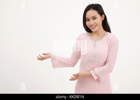 malay woman with hand gesture salam Stock Photo - Alamy