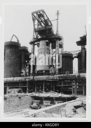 This image shows the construction of a blast furnace with a BHP ship in ...
