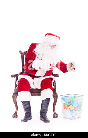 Bad Santa reading letters Stock Photo - Alamy