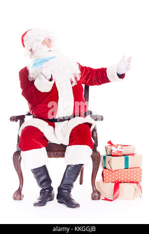 Santa launching paper airplane Stock Photo - Alamy