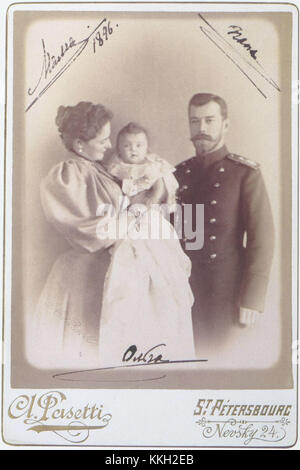 Portraits of Tsar Nicholas II, his wife Tsarina Alexandra are seen ...