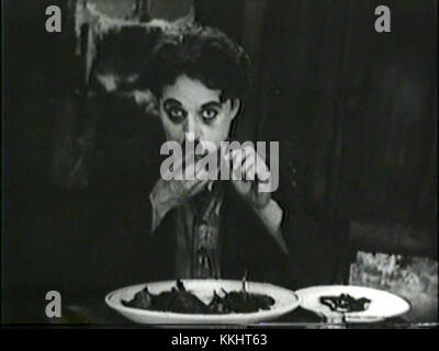 This scene from the 1925 silent film The Gold Rush features Charlie ...