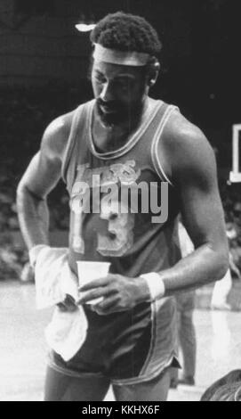 Wilt Chamberlain, a legendary basketball player, known for his record ...