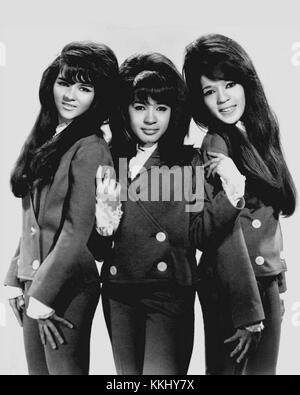 The Ronettes, an iconic American girl group, are featured in this image ...