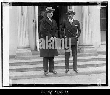 French fashion designer Lucien Lelong wearing a double-breasted suit ...