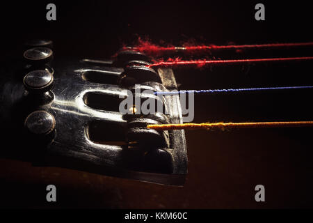 Closeup view of an old dusty cello, accentuated shapes with light Stock ...