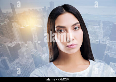Attentive brunette woman showing her emotions Stock Photo - Alamy