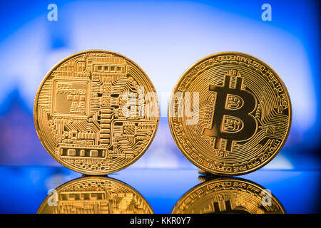 Close up two sides of golden bitcoin physical coin isolated on white ...