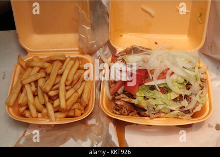 After pub essential doner kebab and chips a greasy treat Stock Photo ...