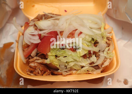 After pub essential doner kebab and chips a greasy treat Stock Photo ...