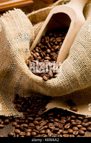 Grains of coffee with a smoking aroma Stock Photo - Alamy