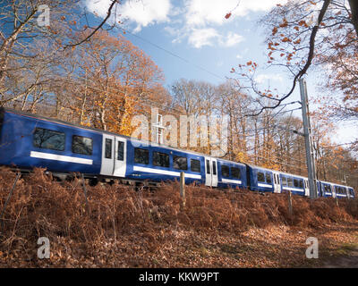 aerial view of blue train moving fast Stock Photo - Alamy