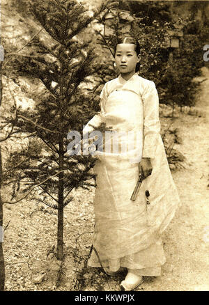 A Kisaeng, a traditional Korean female entertainer, prepares to perform ...