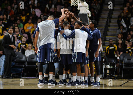 Richmond, Virginia, USA. 2nd Dec, 2017. VCU cheerleaders walk on their ...