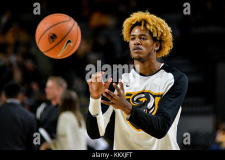 Richmond, Virginia, USA. 2nd Dec, 2017. VCU cheerleaders walk on their ...