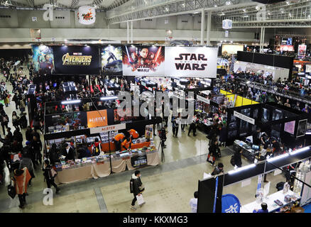 Chiba, Japan. 1st Dec, 2017. Models in cosplay of Black Panther pose ...