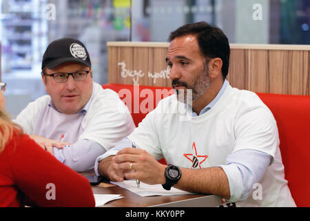 Press conference of Jose Cil (center), President of Burger King, and ...