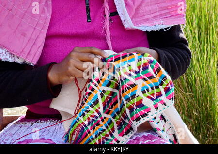 Mexican indigenous women hand sewing colorful textiles in Mexico Stock ...