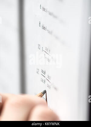 Studying for challenging Math Test Stock Photo - Alamy