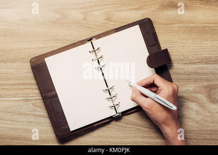 Pencil writting on notebook on white background Stock Photo - Alamy