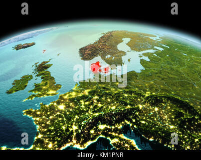 Morning above Denmark highlighted in red on model of planet Earth in space with visible border ...
