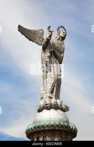 Virgin Mary de Quito Statue with a set of angel wings atop a dome ...