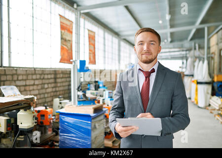 Successful Salesman in Industrial Shop Stock Photo - Alamy