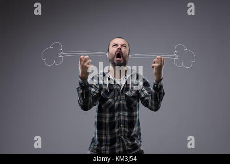 Very angry man letting off steam Stock Photo - Alamy
